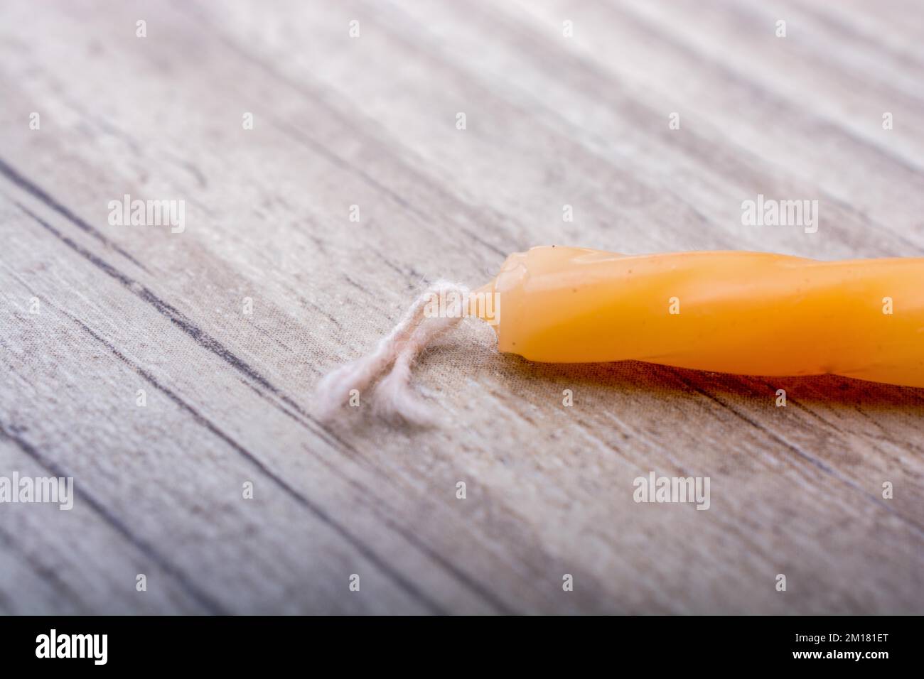 Colorful candle stick on a grey wooden background Stock Photo - Alamy