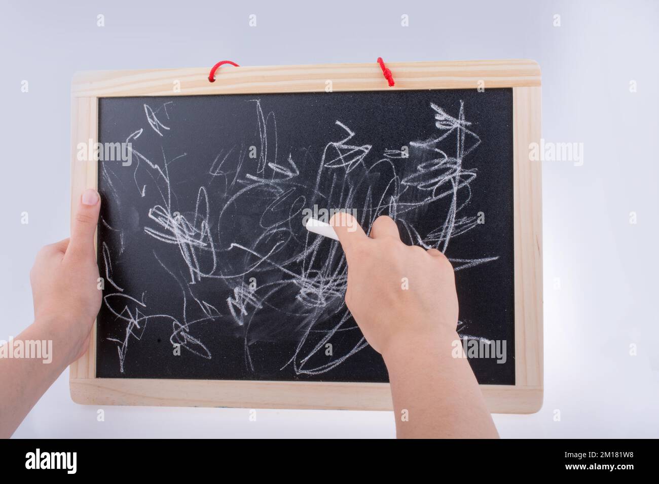 Hand holding Dirty blackboard on a white background Stock Photo - Alamy
