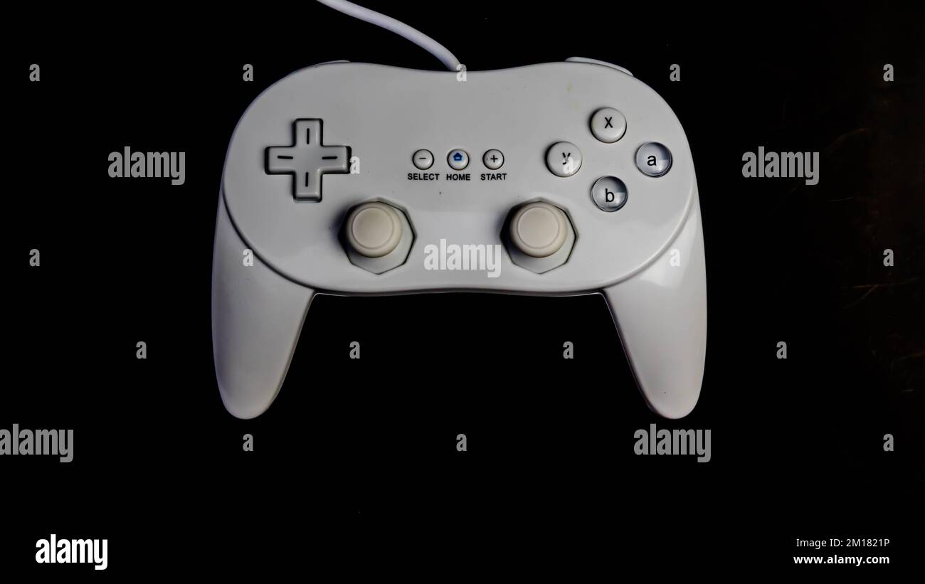 white joystick isolated on black background Stock Photo - Alamy