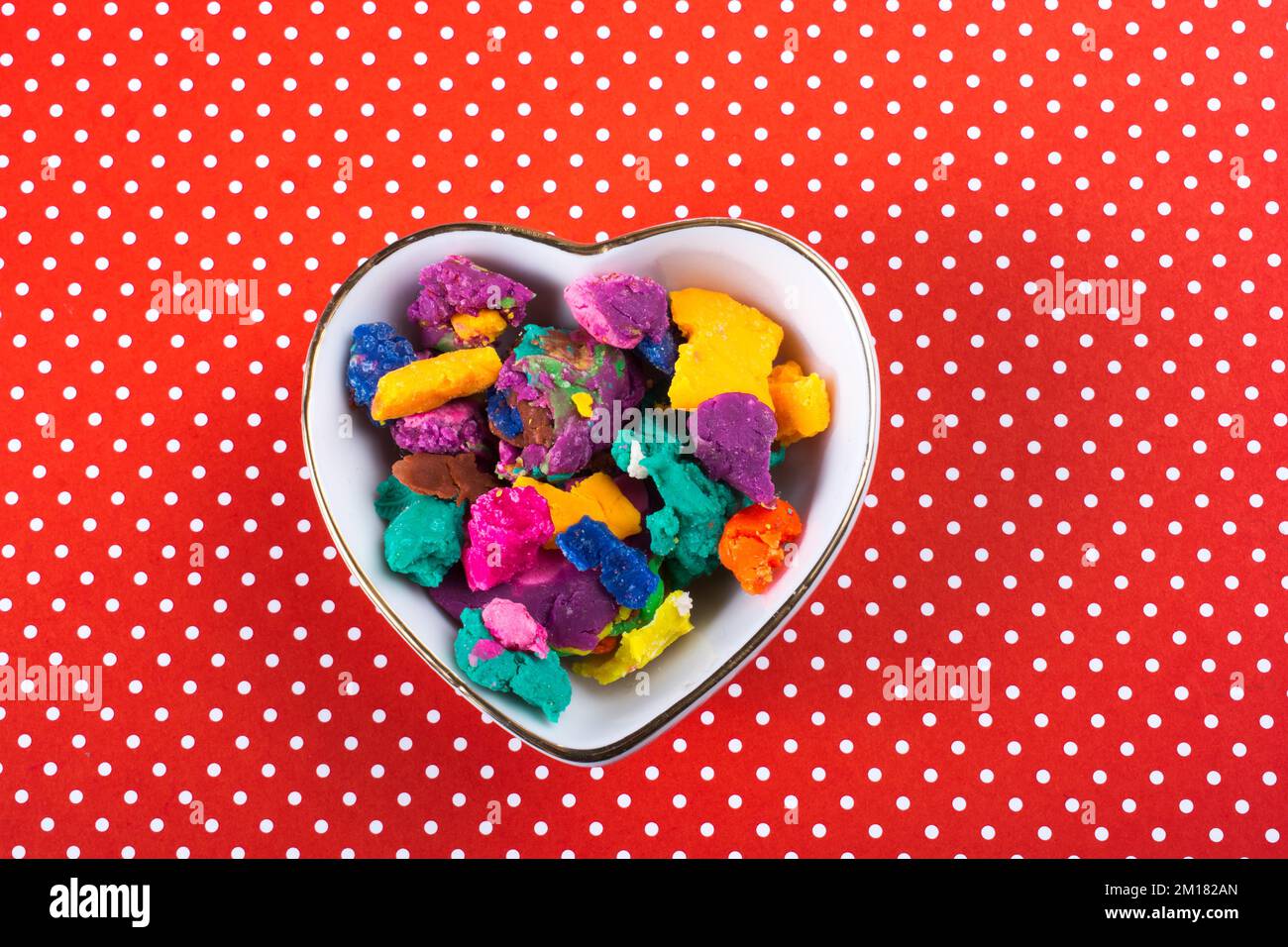 Dry colorful play dough in smal pieces Stock Photo - Alamy