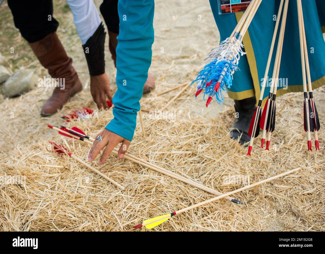 Arrow in hand as rprojectile weapon system archery Stock Photo - Alamy