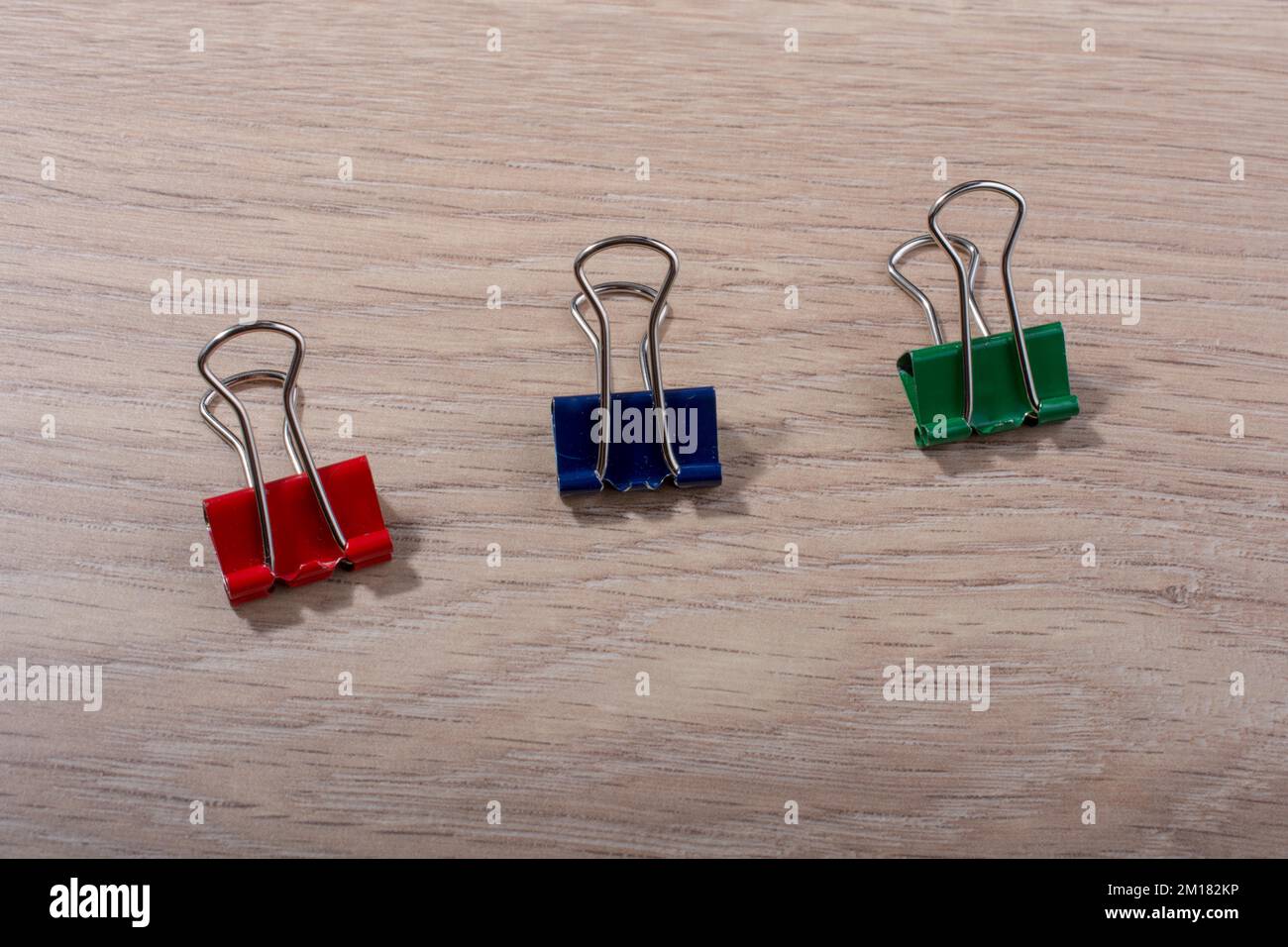 Picture of metallic binder clips with handles in view Stock Photo - Alamy