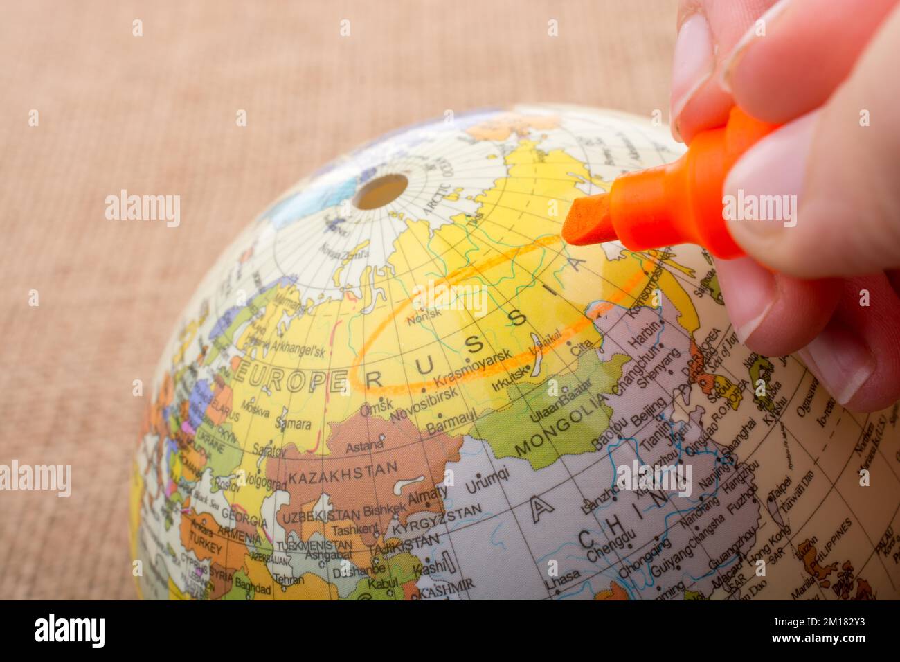 Globe is placed on canvas background Stock Photo - Alamy