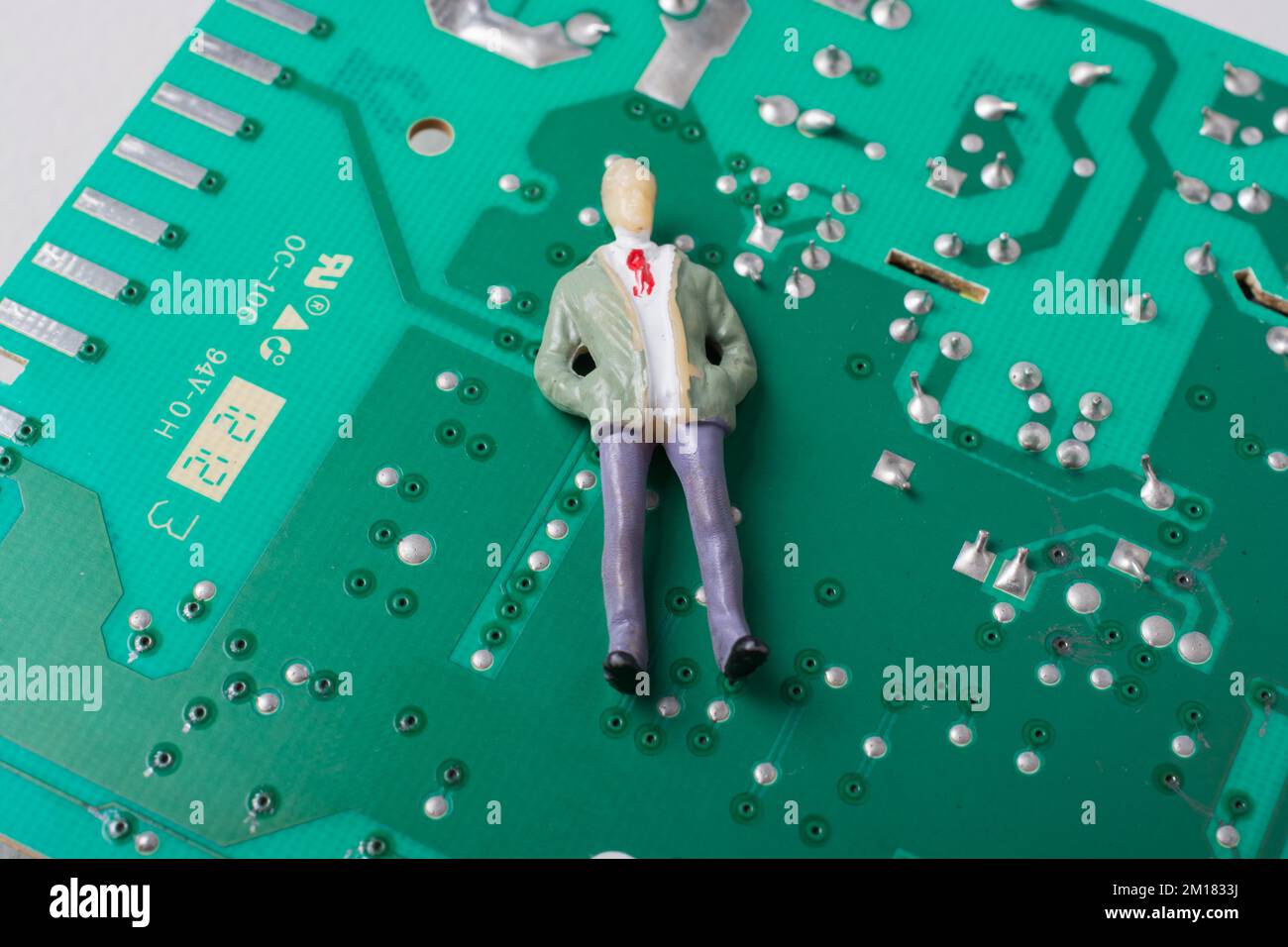 Tiny figurine of men model on Circuit board of electronics Stock Photo ...