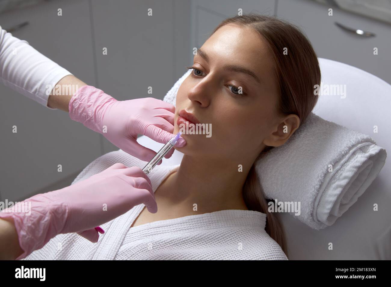 Rejuvenating facial injections procedure for tightening and smoothing ...