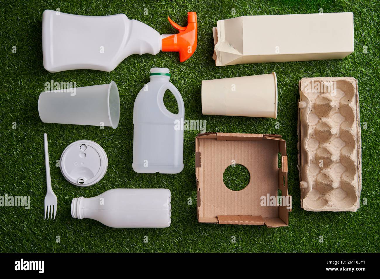 A selection of garbage for recycling. Segregated plastic and paper on ...