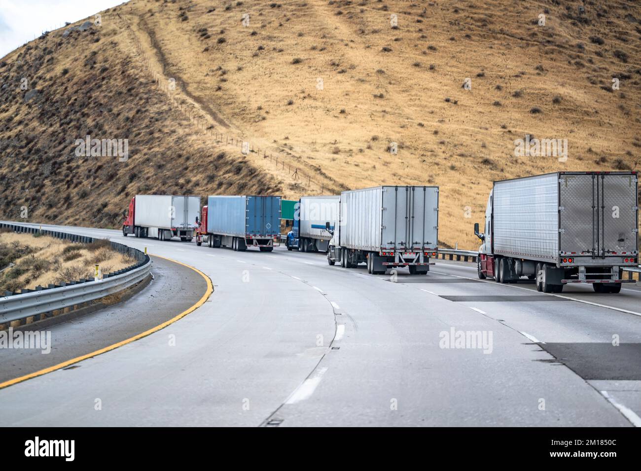 Convoy of a industrial grade commercial transportation of different big ...
