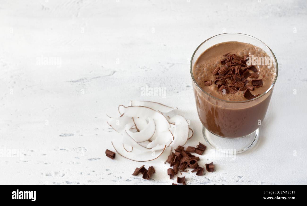 Chocolate coconut milk on light gray background, top view, space Stock ...
