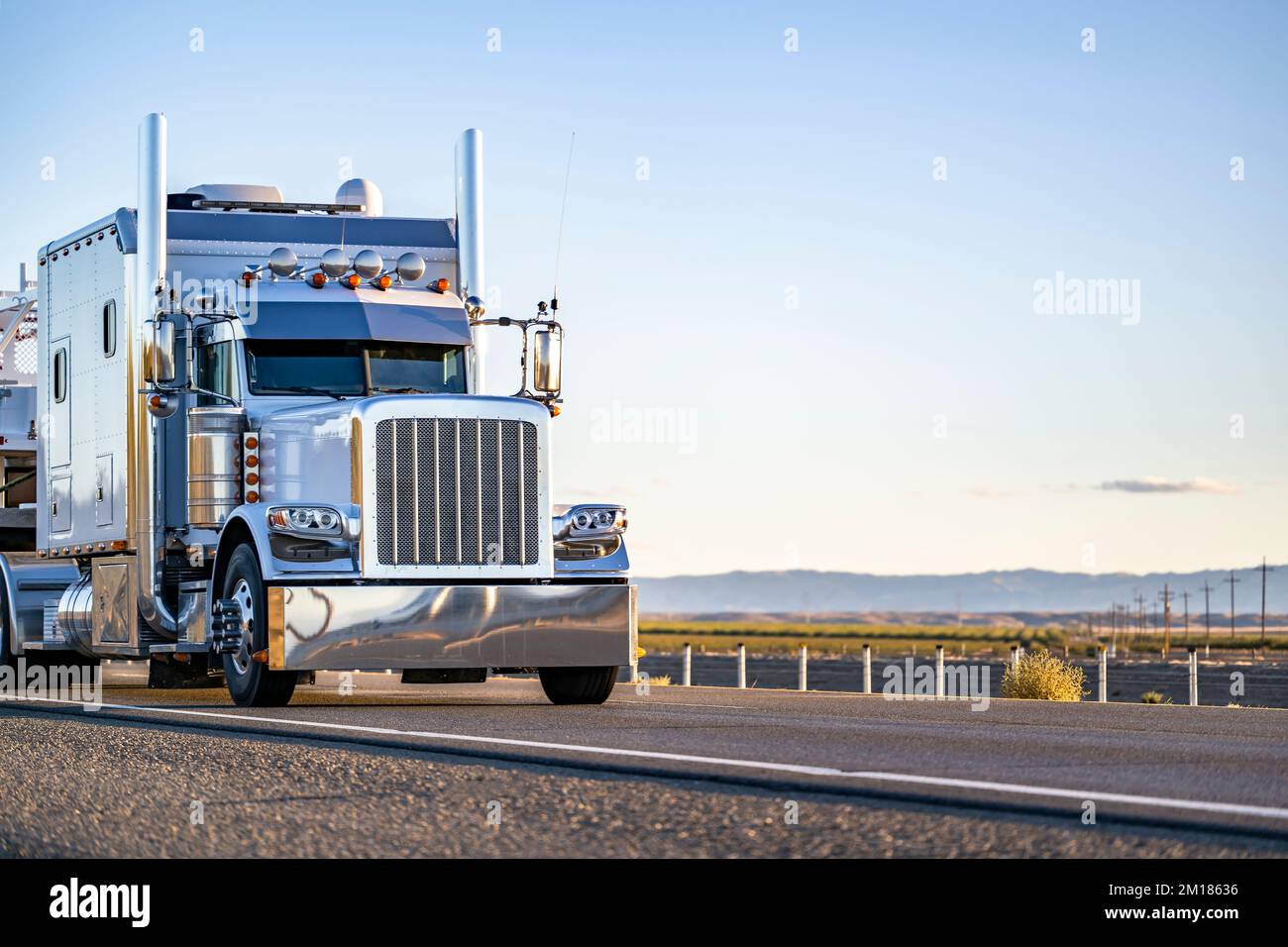 Long extended cab big rig white classic powerful stylish semi truck ...