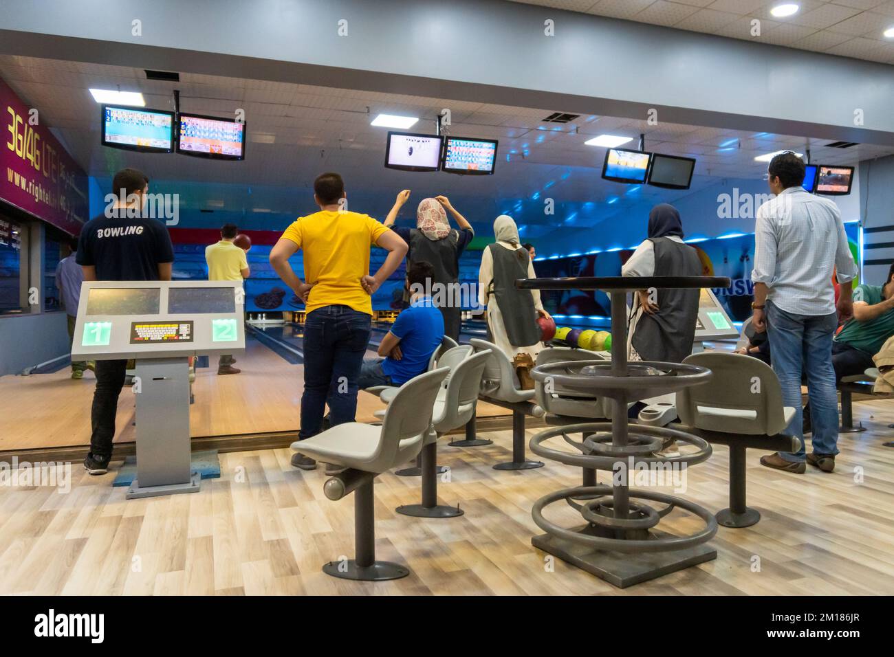 Tehran, Iran - June, 2018: A bowling alley in Tehran, Iran, where young ...