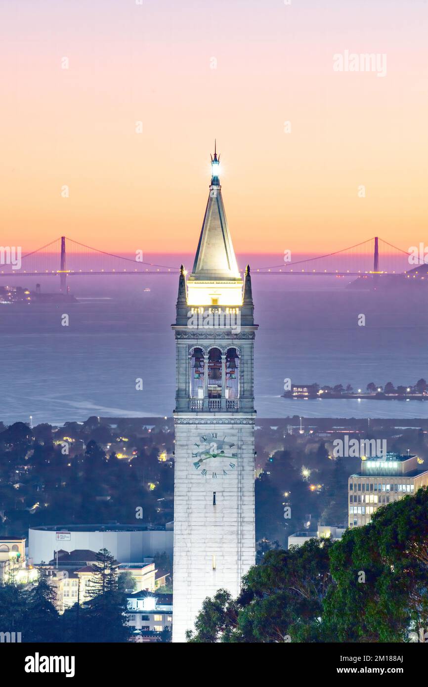 A vertical aerial view of Sather Tower during sunset with Golden Gate ...
