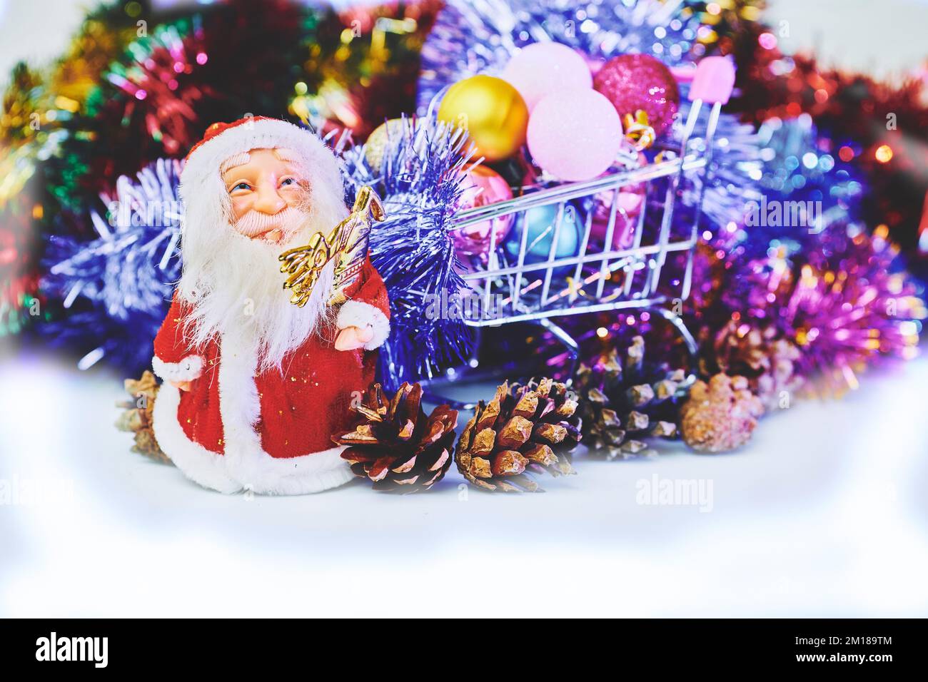Santa Claus and New Year's Christmas toys, pine cones Stock Photo - Alamy