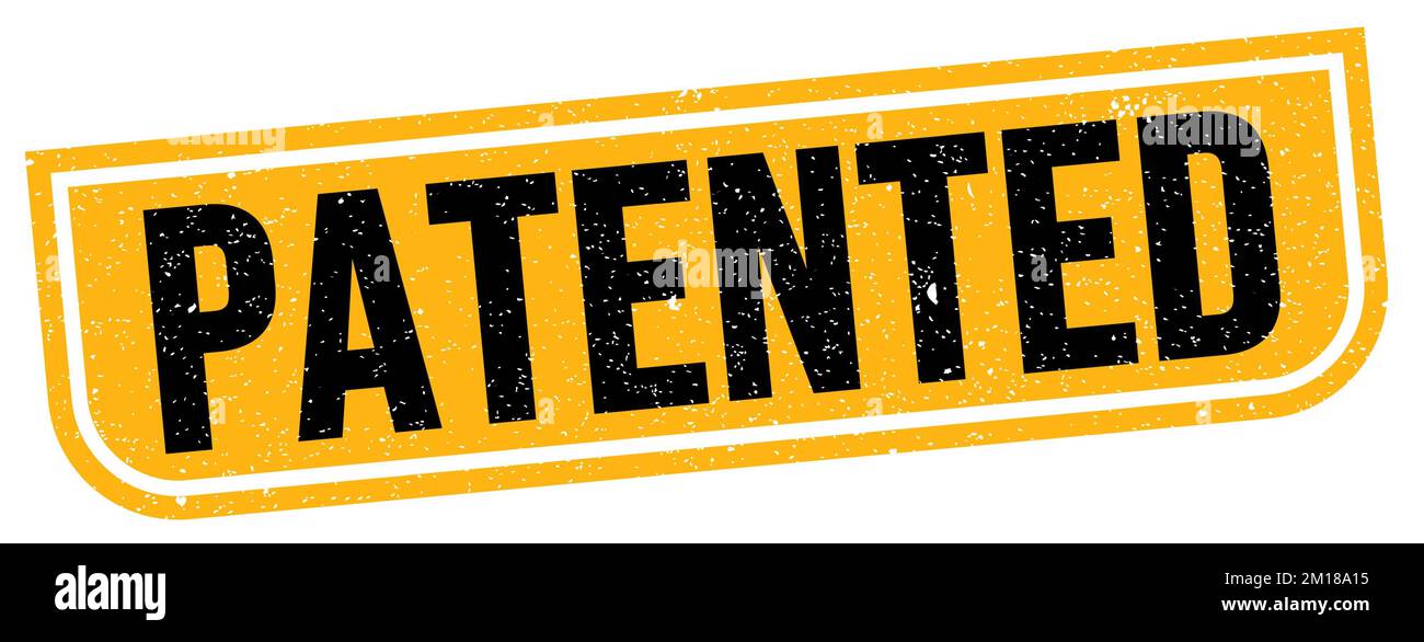 PATENTED text written on yellow-black grungy stamp sign Stock Photo - Alamy