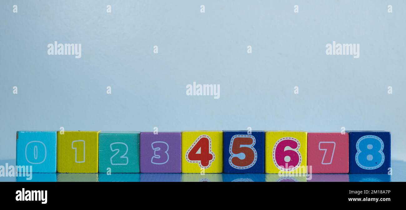 A panoramic view of cubes with numbers on the blue background Stock ...