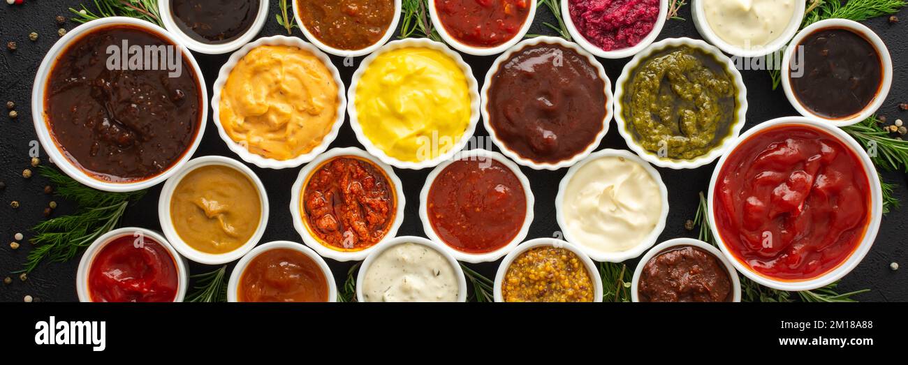Different types of sauces in bowls with seasonings banner, rosemary and ...