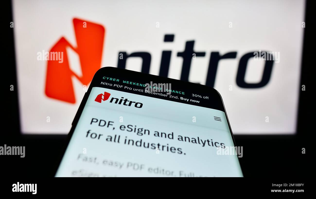 Smartphone with webpage of software company Nitro Inc. on screen in ...