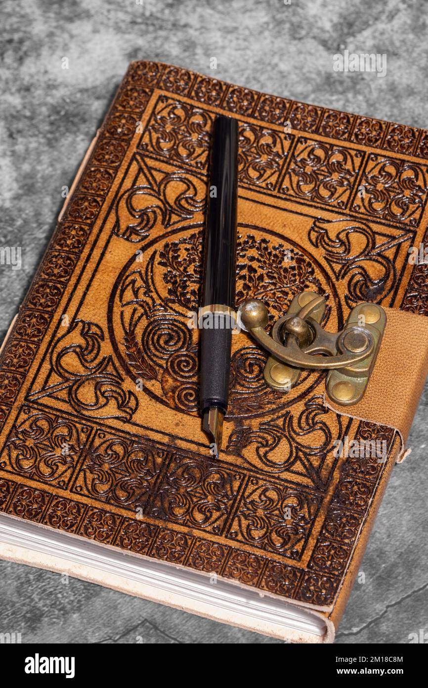 Leather journal, embossed with Celtic tree of life design, with ...