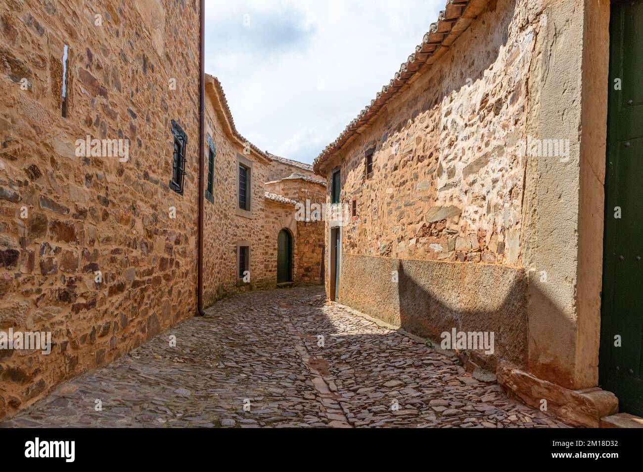 A beautiful view of the medieval street lined with houses in Castrillo ...