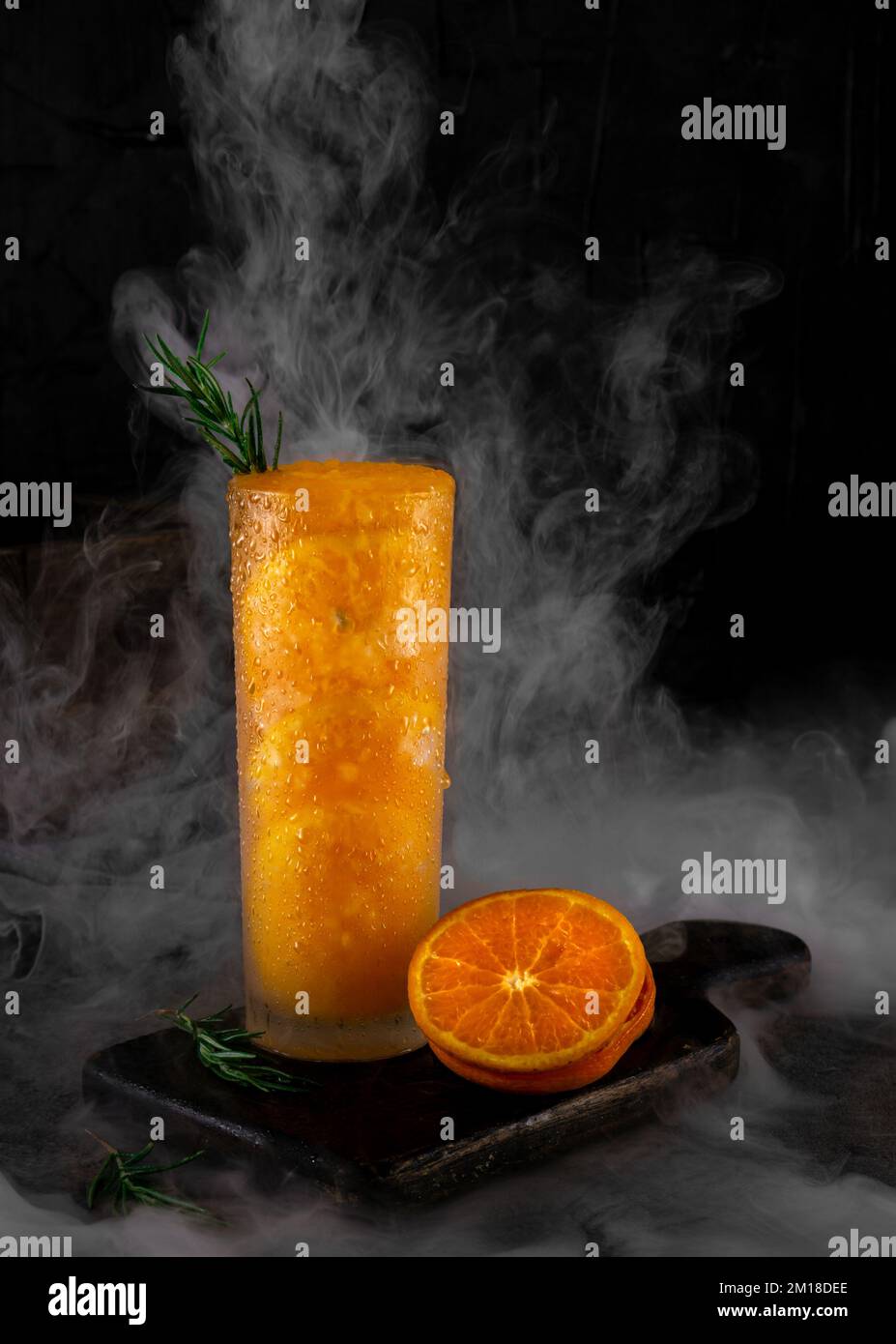 Orange juice in dark background. Conceptual photography. Healthy drink ...