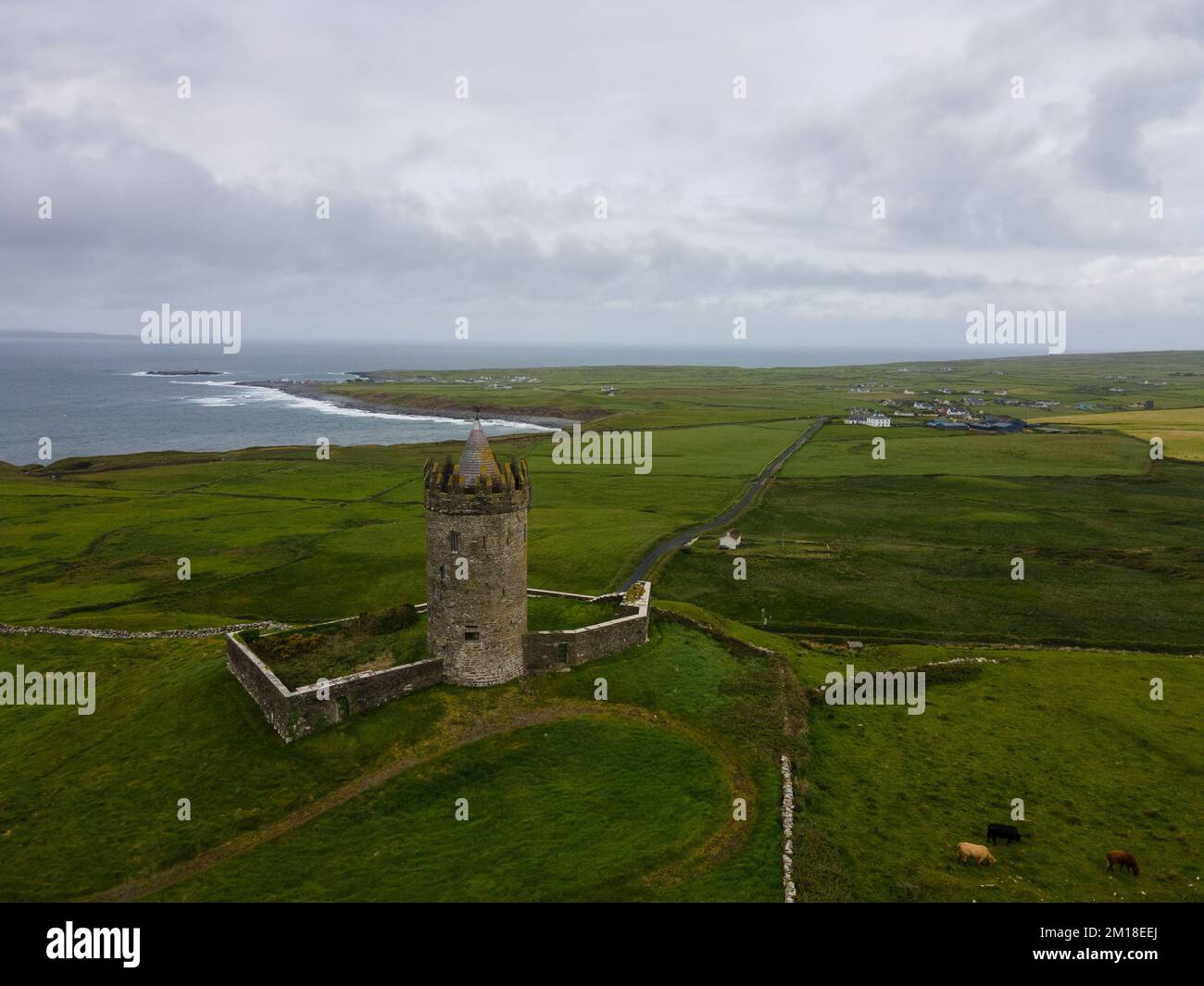 Ireland, County Clare, the 16th-century Doonagore Castle near Doolin ...