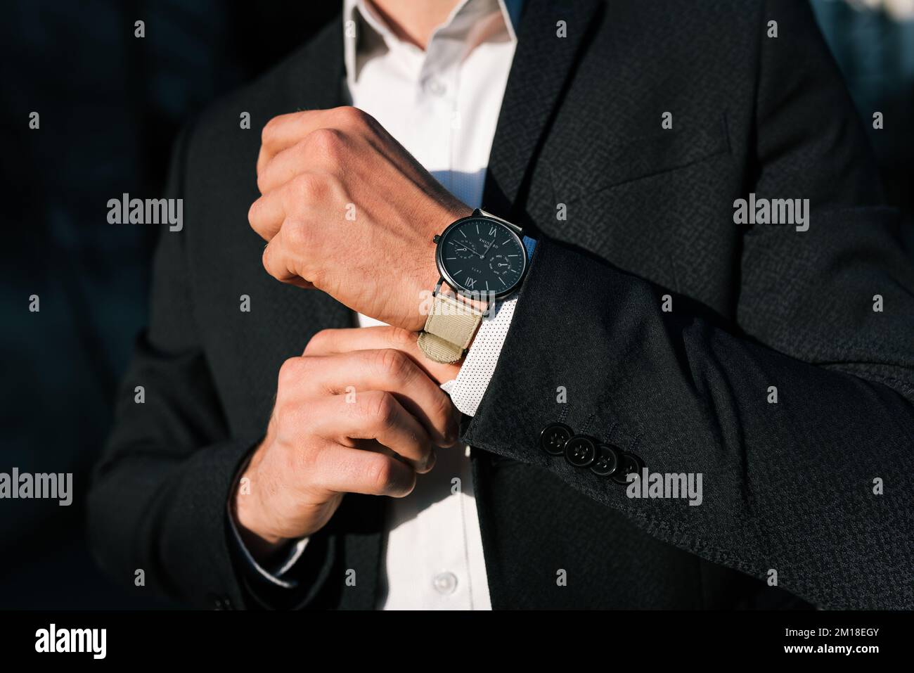 A male hands showing watch in the hand Stock Photo - Alamy