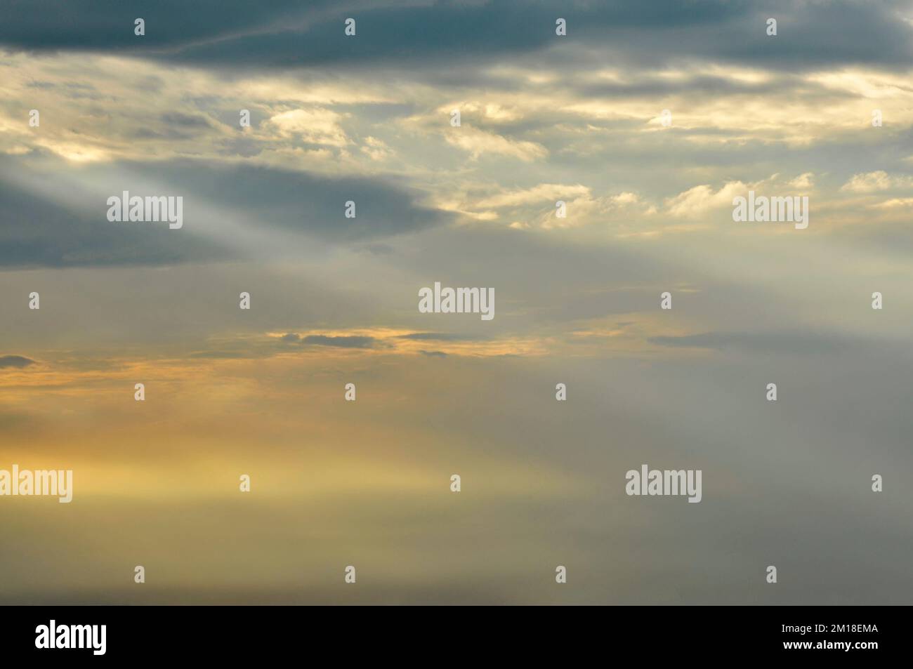 sunset over the cloud Stock Photo - Alamy