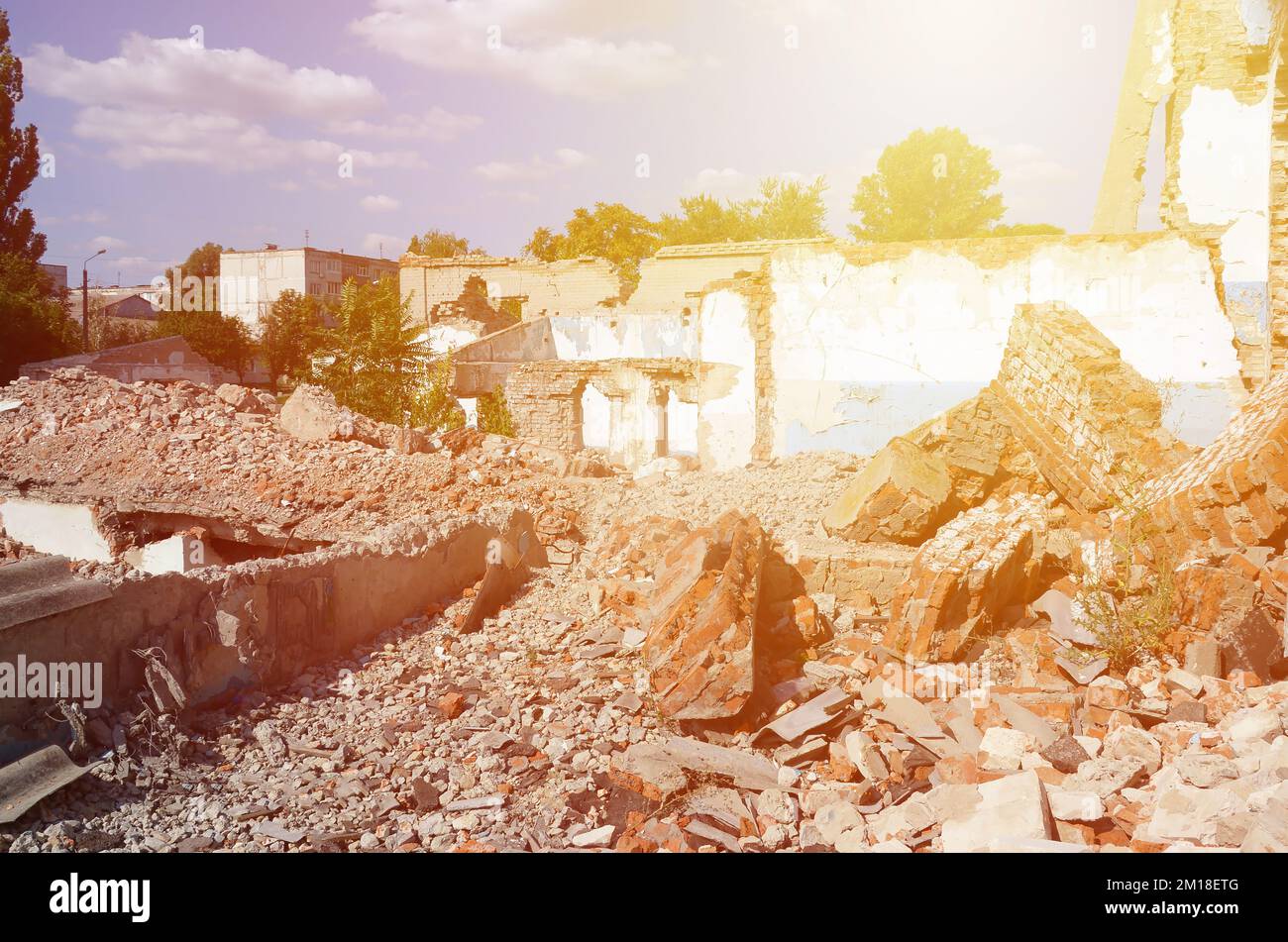 Collapsed industrial multistorey building in daytime. Disaster scene ...