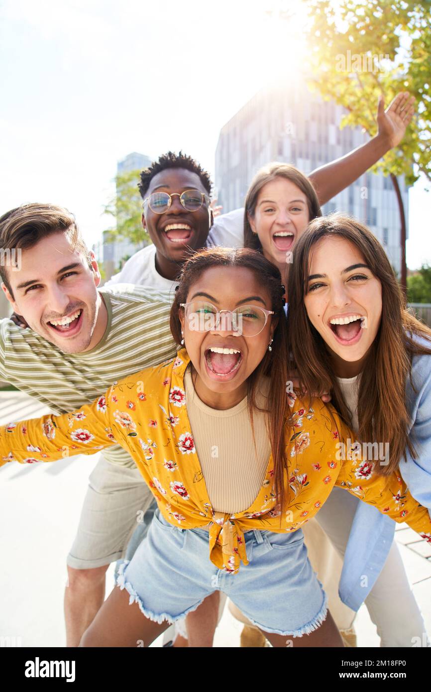 Happy Young friends looking Camera and laughing Smiling Group of people ...