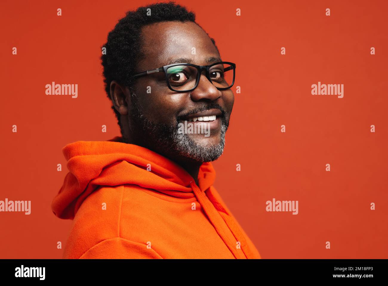 Adult african american man wearing eyeglasses smiling at camera ...