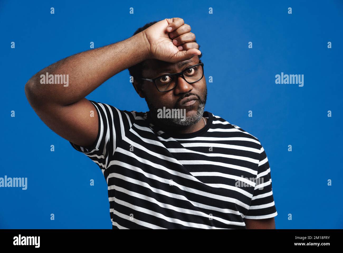 Frowning his forehead hi-res stock photography and images - Alamy
