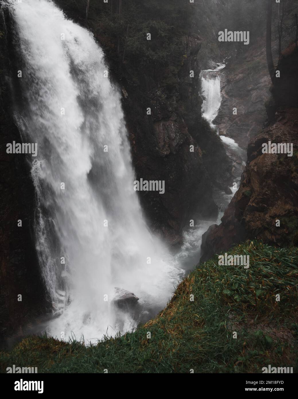 A beautiful view of a waterfall in Dolomites in Italy Stock Photo - Alamy