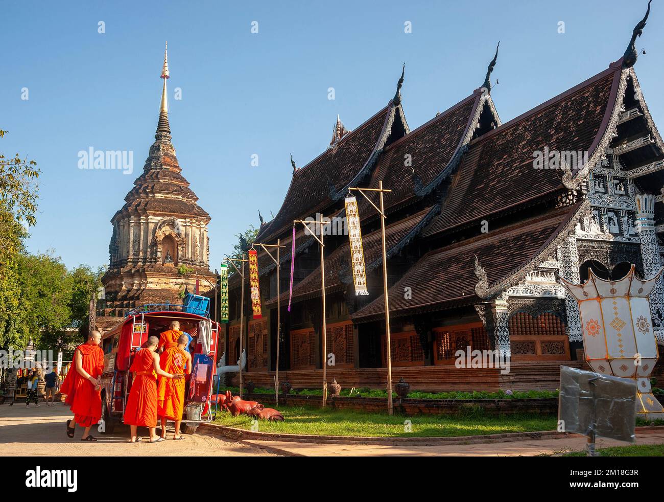 Thai Buddhist novices seen getting in a red taxi from Wat Lok Molee ...