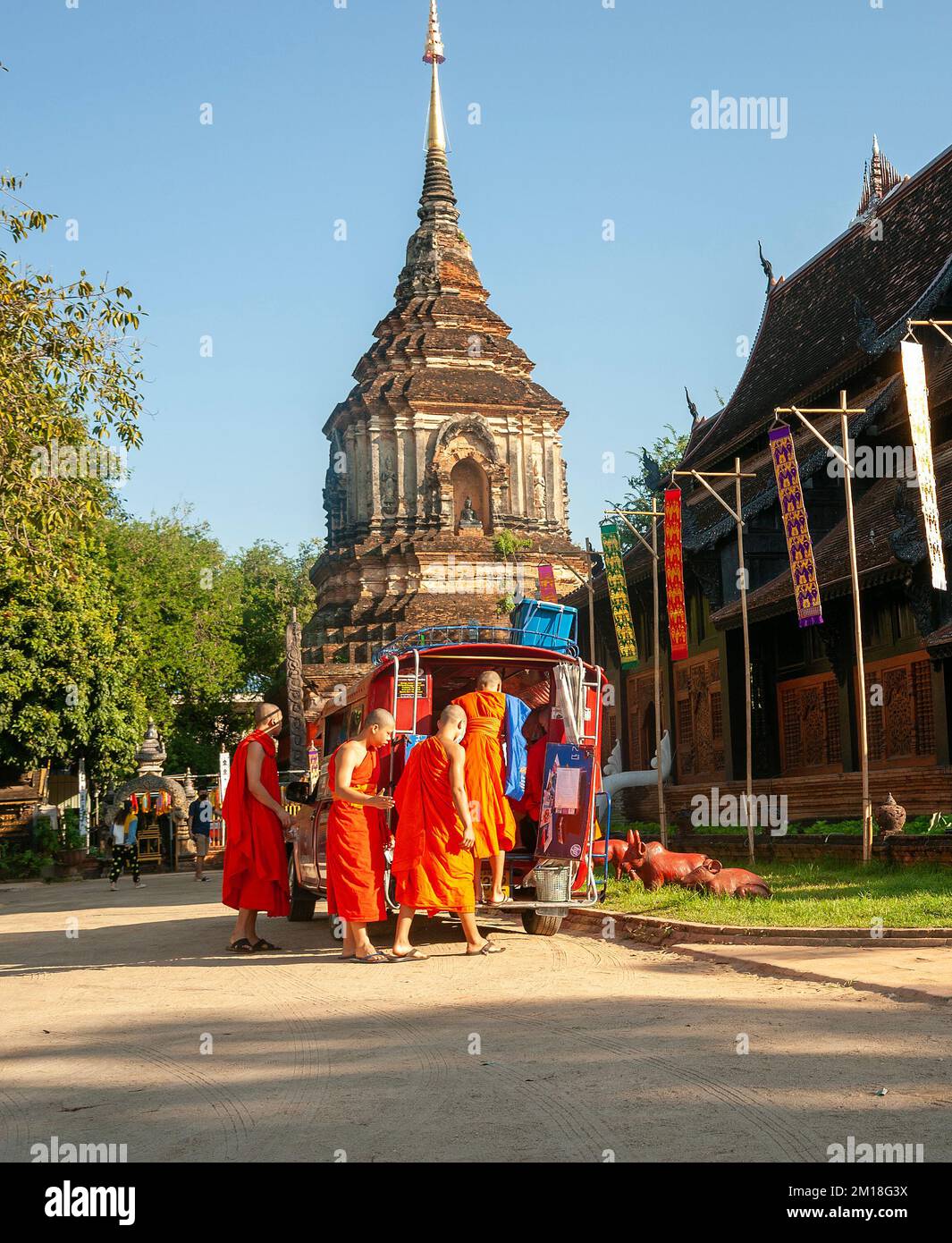Thai Buddhist novices seen getting in a red taxi from Wat Lok Molee ...