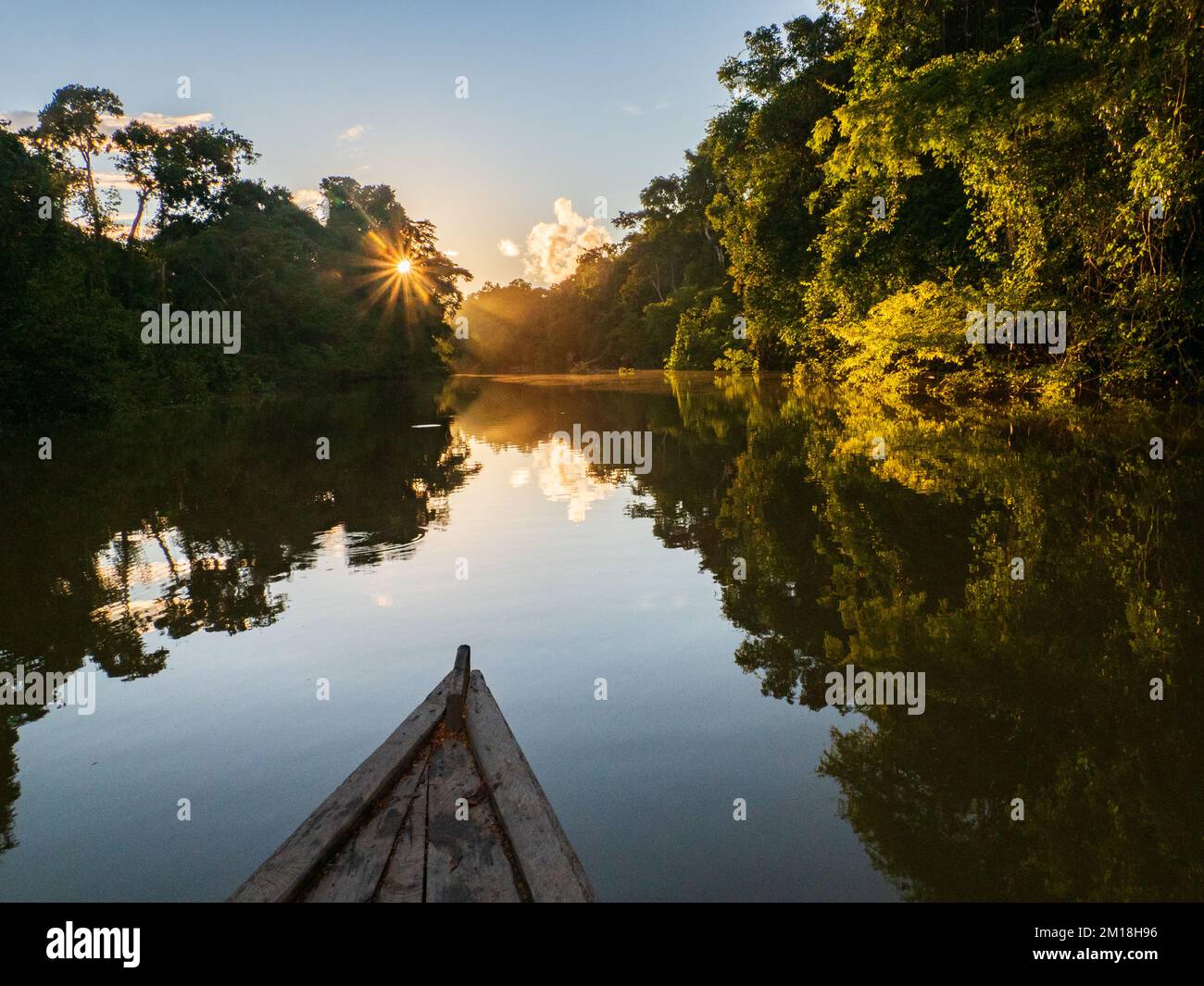 Sunset view seen from the wooden boat on Mata Mata Lagoon near the ...