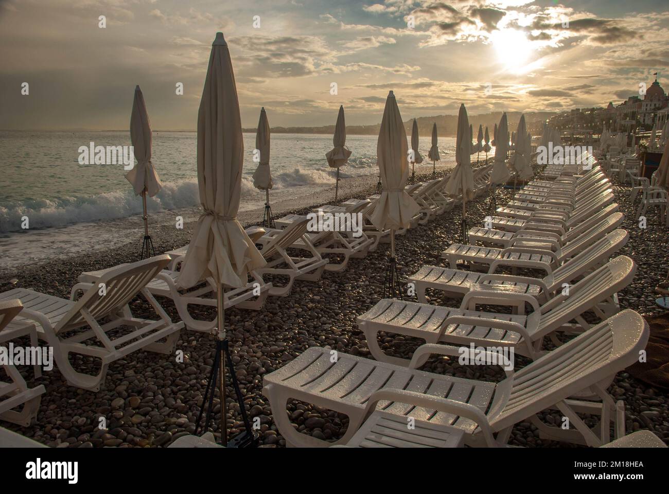 Sun loungers on the beach at Nice, France Stock Photo - Alamy