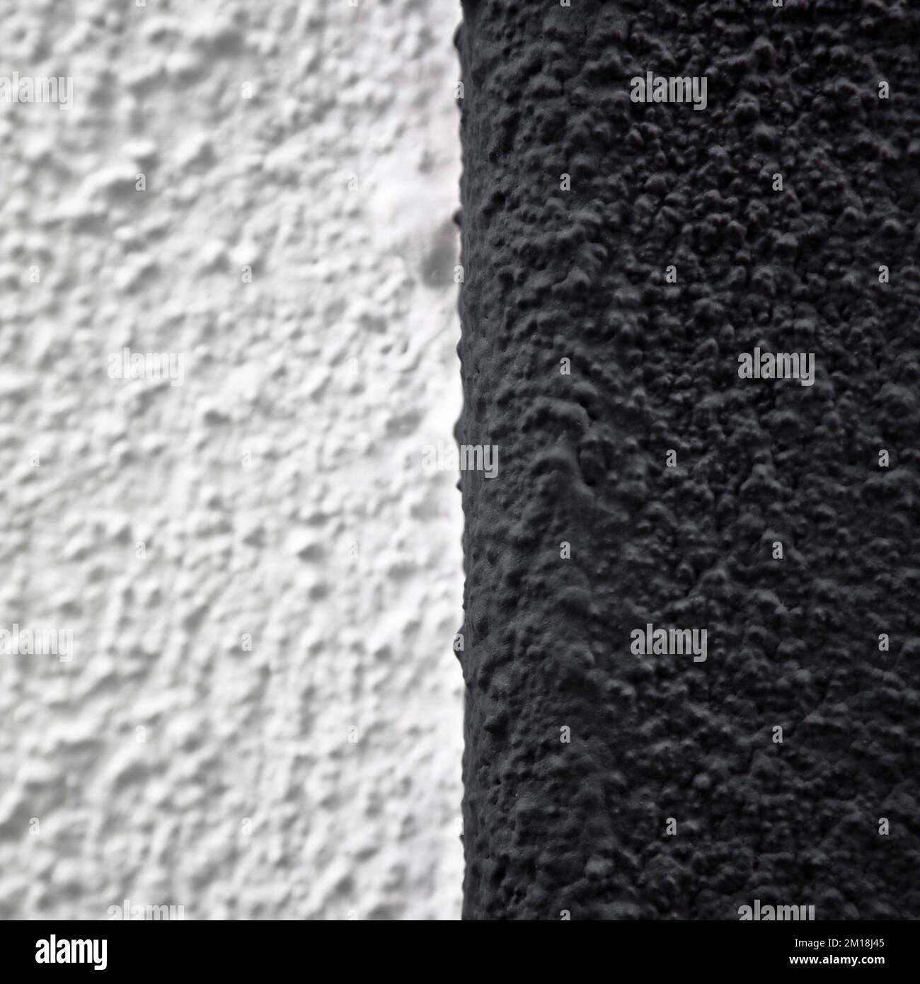 Black and white colored wall texture with rough surface, two color ...