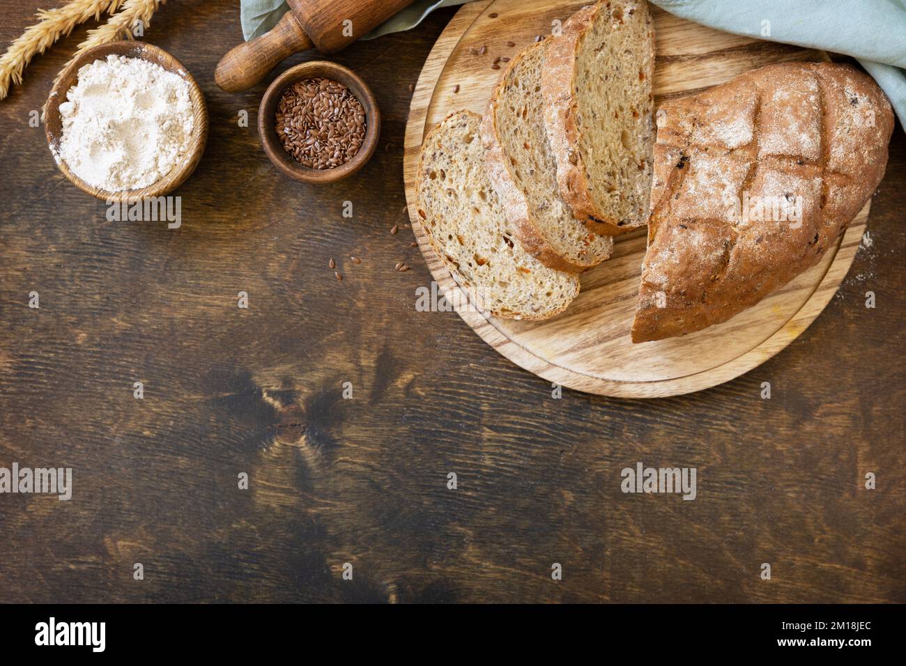 Homemade baking. Bread from whole wheat grains, wheat bran, seeds, bio ...