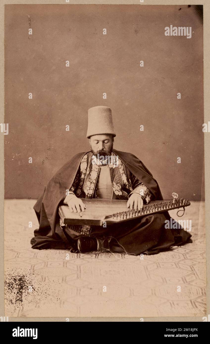Studio portrait of man playing zither , Zithers, Musicians. Nicholas ...