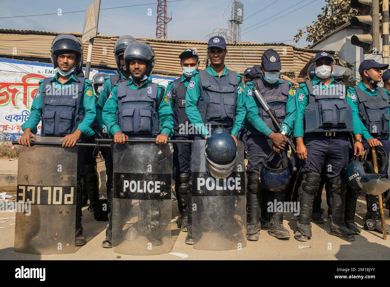Bangladesh police officers stand on guard during the demonstration ...