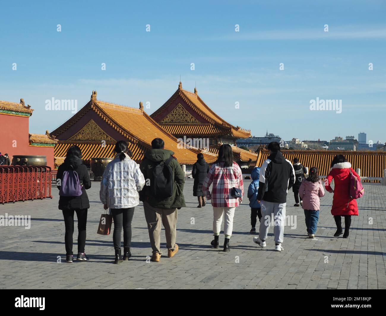 BEIJING, CHINA - DECEMBER 11, 2022 - Visitors wearing masks visit the ...