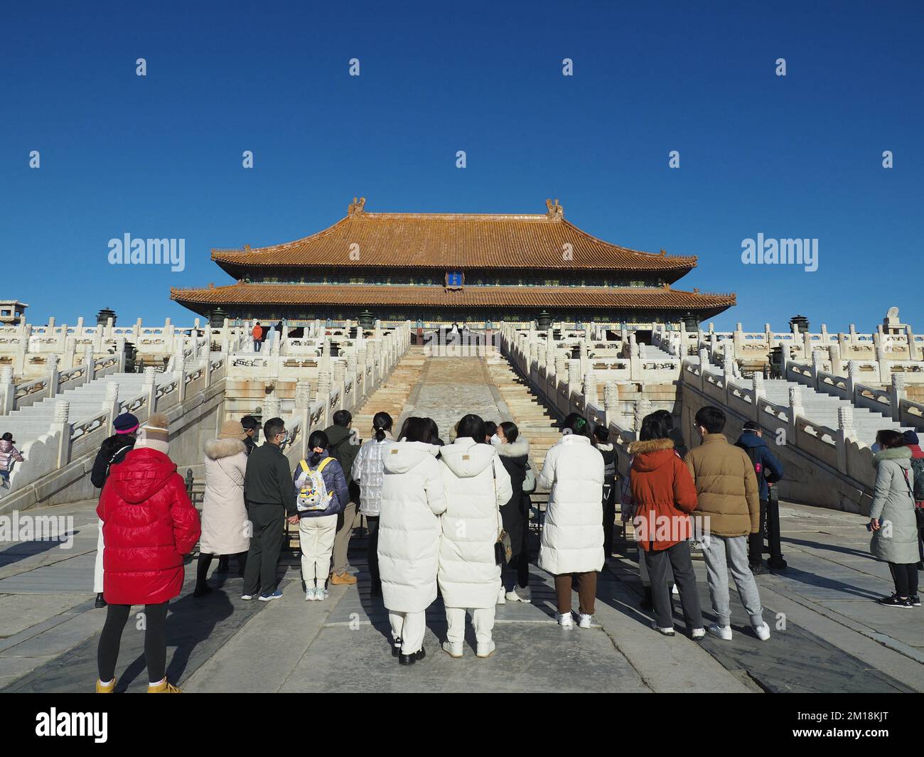 BEIJING, CHINA - DECEMBER 11, 2022 - Visitors wearing masks visit the ...