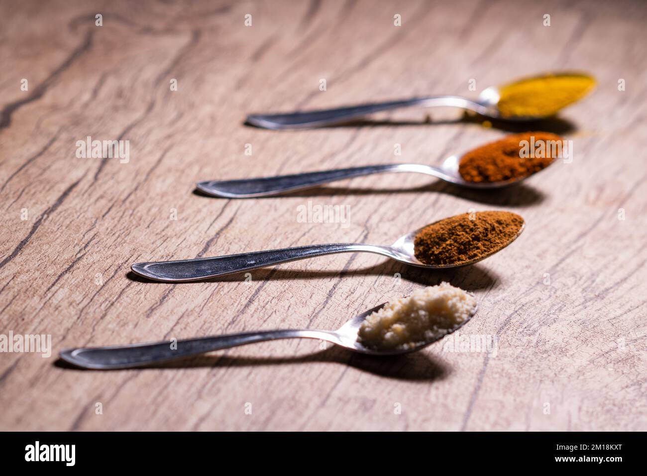 Typical Brazilian Spices - Almonds, cinnamon, paprika and turmeric ...