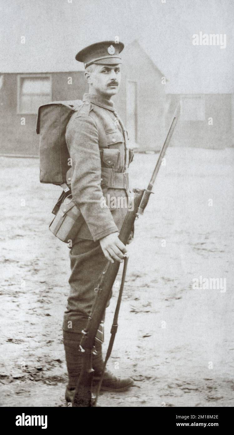 A First World War British sapper in the Royal Engineers with 1908 pattern webbing and a short ...