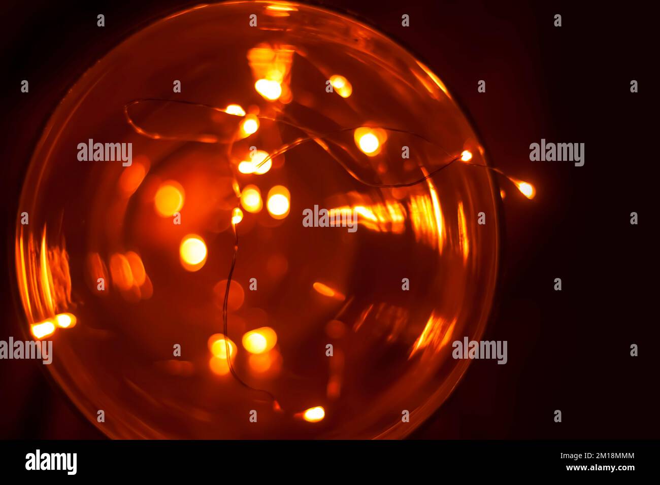 Christmas garland lights. Winter home decor. Blurred bokeh festive ...