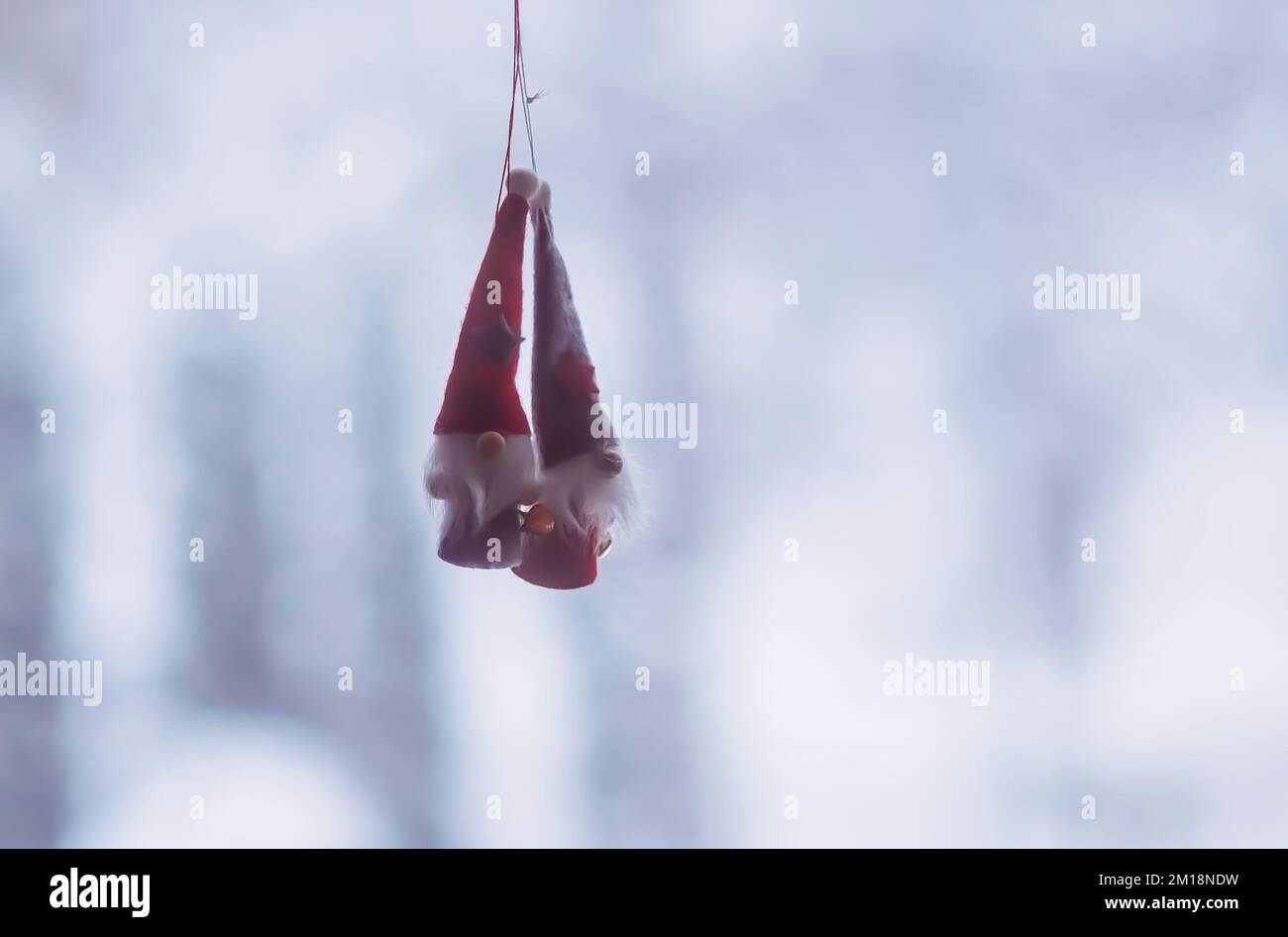 Cute gnome in red hat. Decorative Christmas toy Stock Photo - Alamy