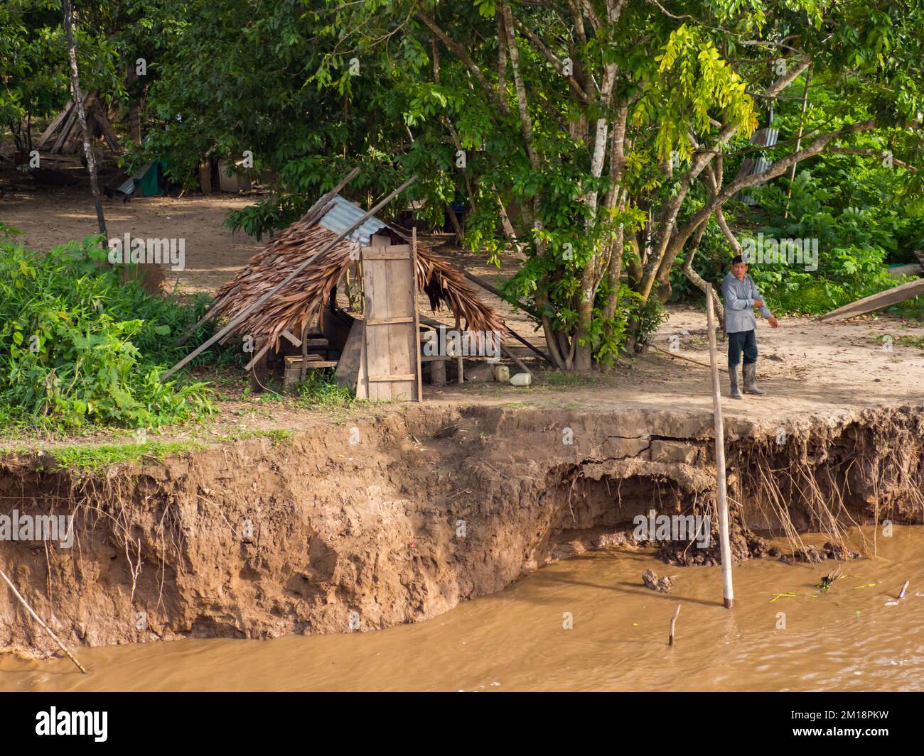 Village, Peru - Dec 2019: Local inhabitants in amazon jungle on the ...