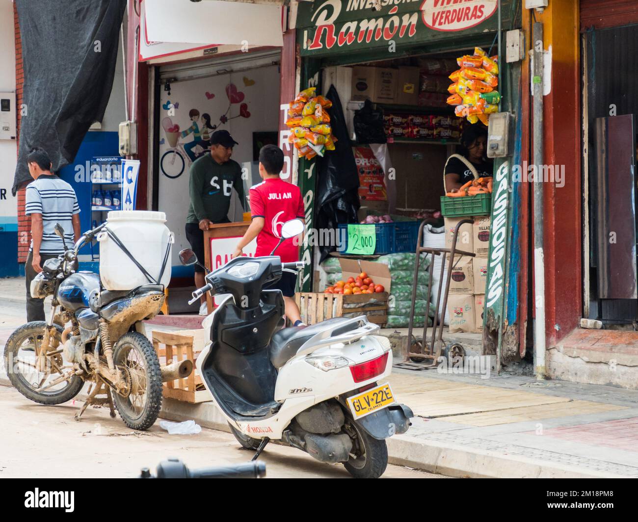 Leticia, Amazonas, Colombia, December, 2019: A muddy motorbike with a ...