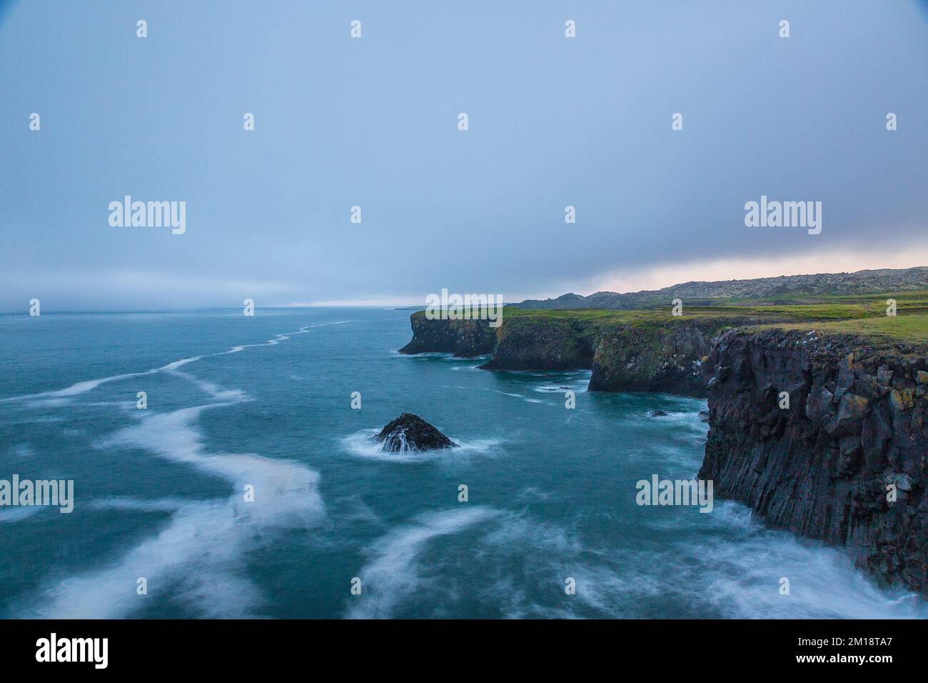 Long exposure picture of rough coastline in Anarstapi on Iceland Stock ...