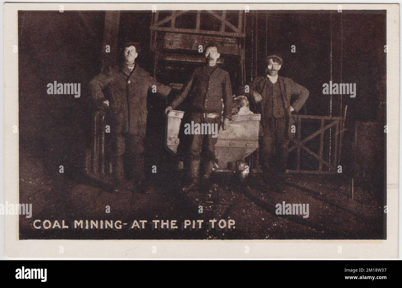 Coal mining - at the pit top: photograph of three coal miners standing ...