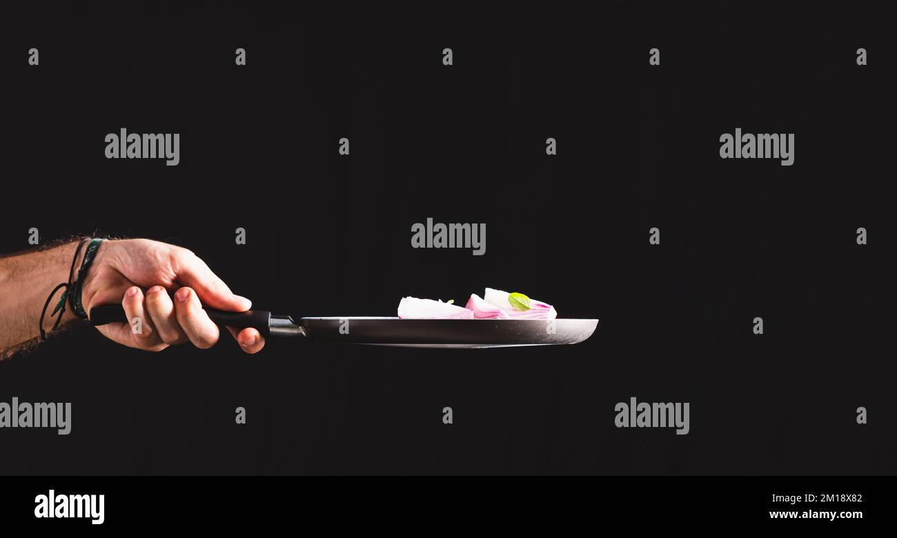Making Brazilian-style Ceviche on Black Background. Frying Pan Throwing ...